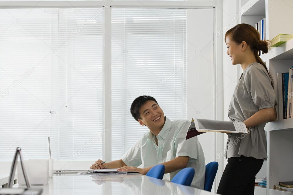 Two colleagues in business office — Stock Photo © XiXinXing #93998830 Two colleagues in business office — Stock Photo © XiXinXing #93998830
