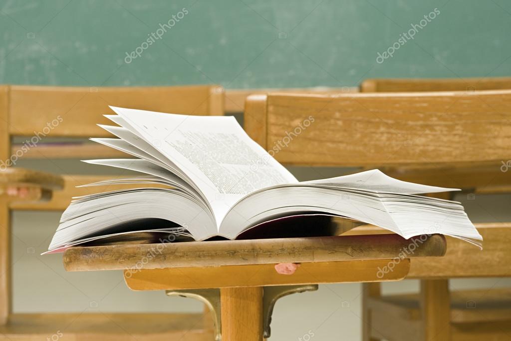 Open book on a desk — Stock Photo © XiXinXing #94006612