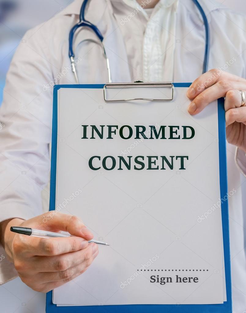 Doctor offers informed consent to sign Stock Photo by ©vchalup2 75571021