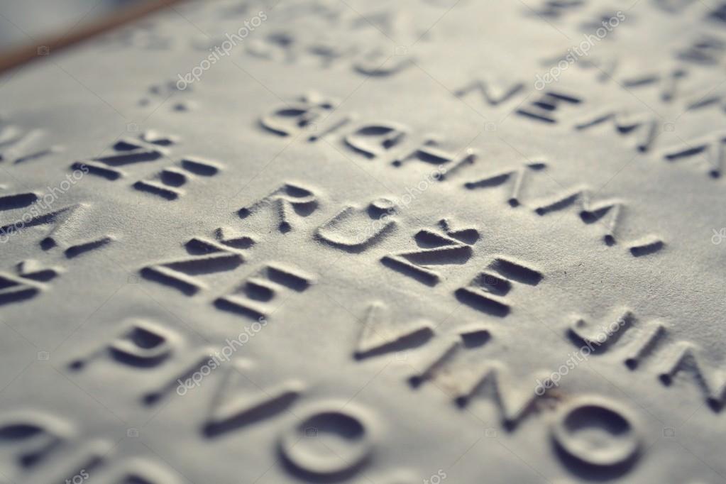 Embossed writing for blind people Stock Photo by ©josekube 54501353