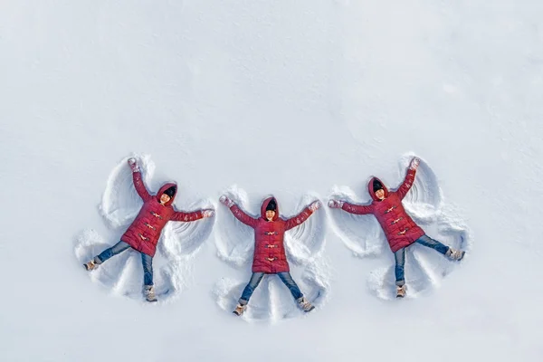 Christmas snow angels Stock Photos, Royalty Free Christmas snow angels ...