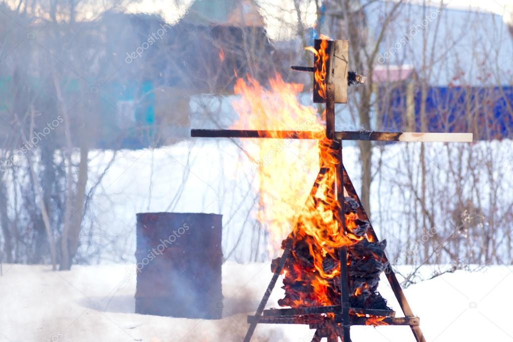 Burning stuffed figure — Stock Photo © watman #106109900