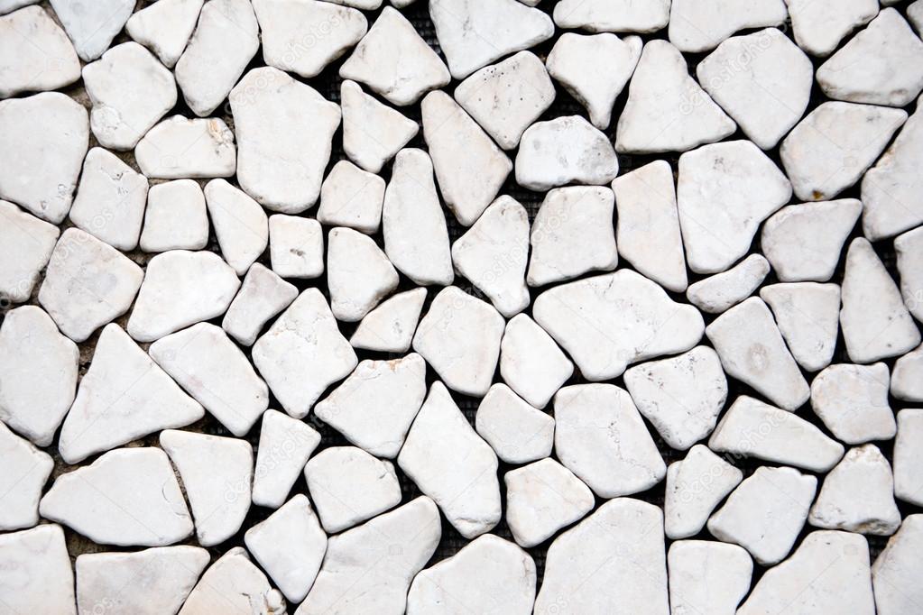 Triangle pebble stone flooring texture Stock Photo by ©watman 66660659