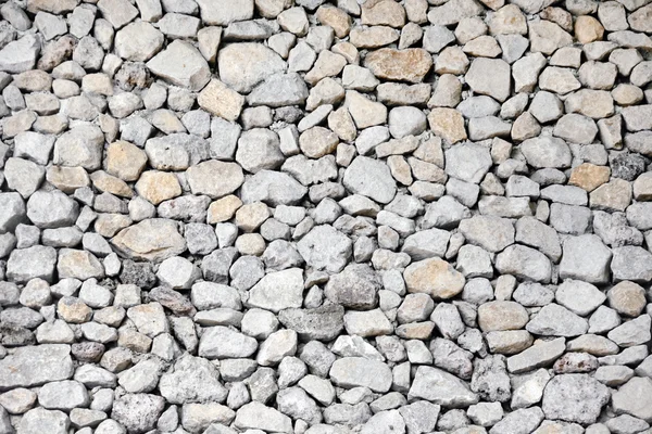 Triangle pebble stone flooring texture Stock Photo by ©watman 66660659