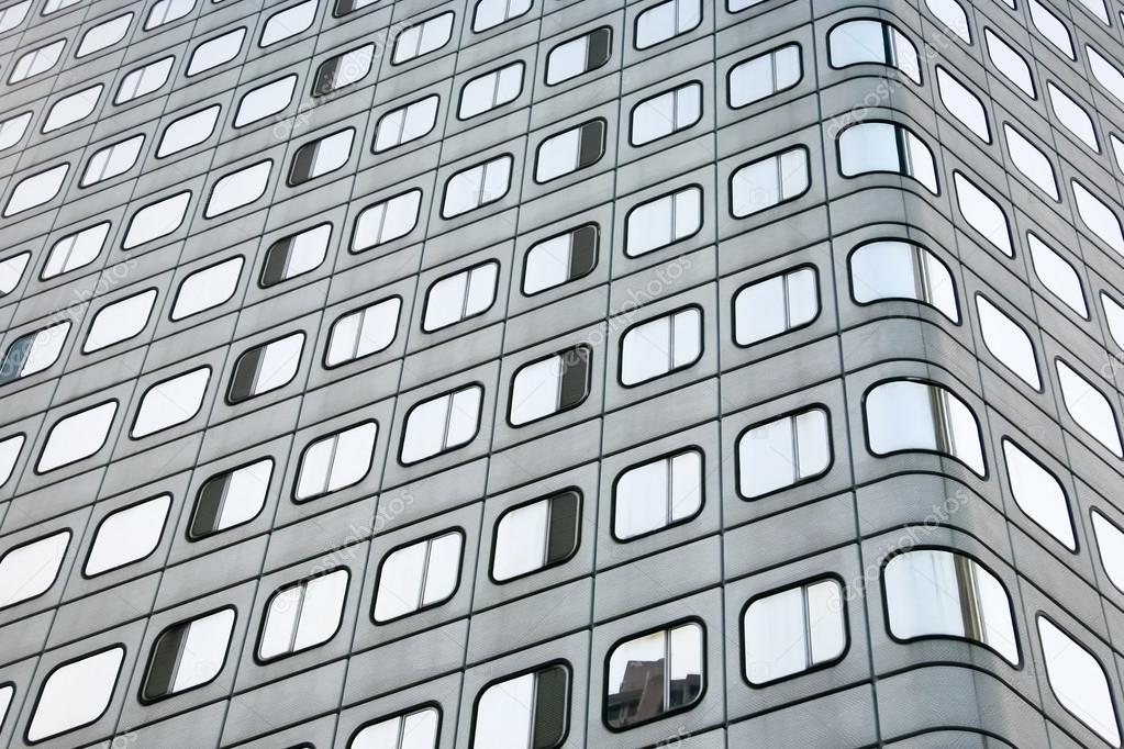 Skyscraper facade with rounded windows Stock Photo by ©watman 67613037