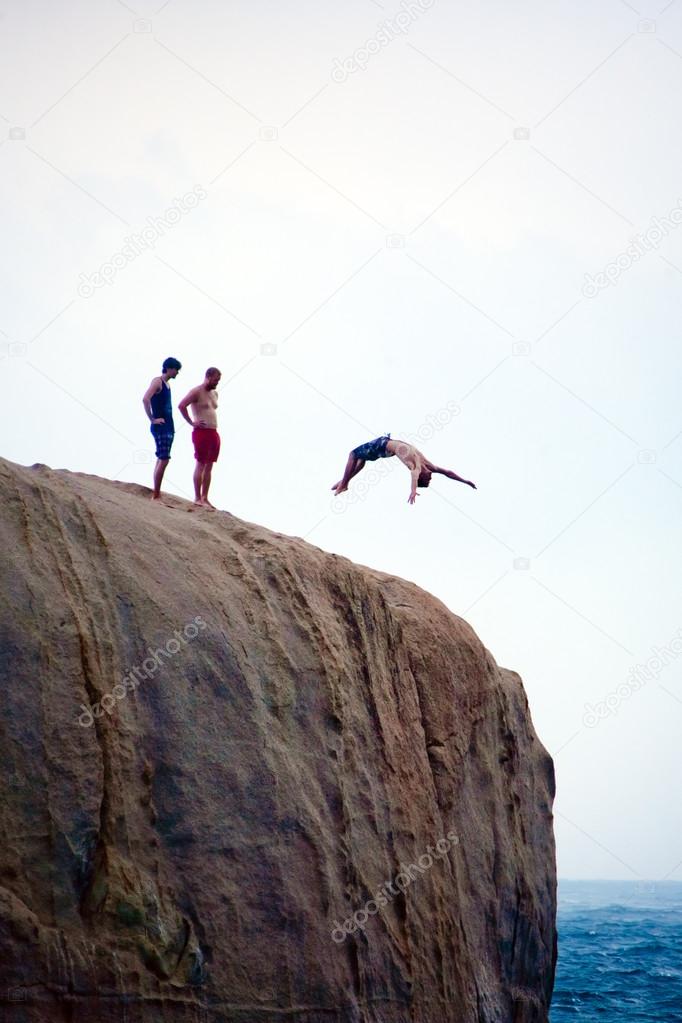 Man jumping from the rock — Stock Photo © watman #67613973