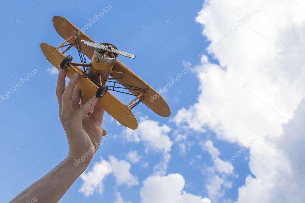 Yellow, retro airplane model Stock Photo by ©watman 77263033