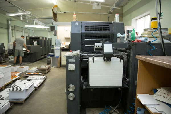 Print shop (press printing) - Finishing line Stock Photo by ©moreno ...