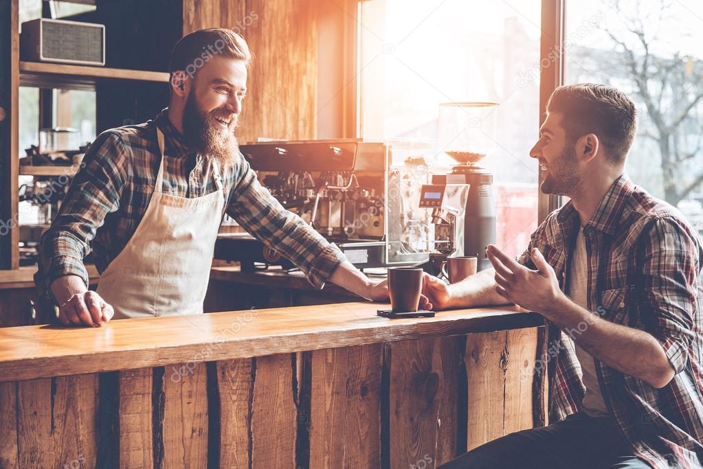 Handsome men at bar counter — Stock Photo © gstockstudio #106948934