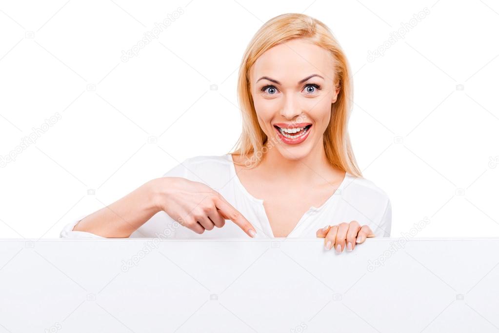 Woman pointing the copy space — Stock Photo © gstockstudio #68854079