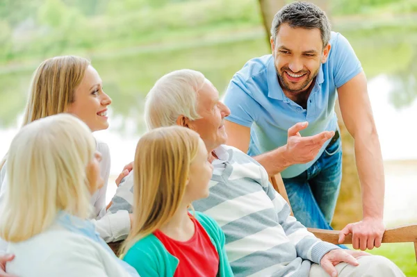 Happy family talking to each other - Stock Image - Everypixel