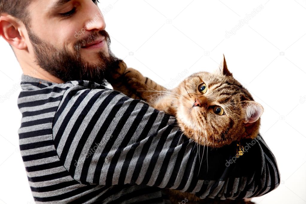 Man hugging his beautiful cat on white background Stock Photo by ...