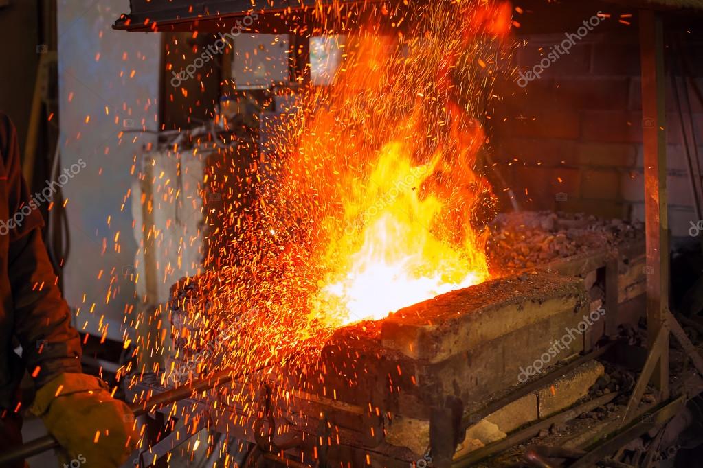 Metal casting in the forge — Stock Photo © romankorytov #63894813