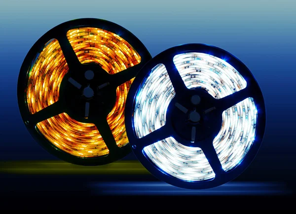 Led diode shining coils on blue background. - Stock Image - Everypixel