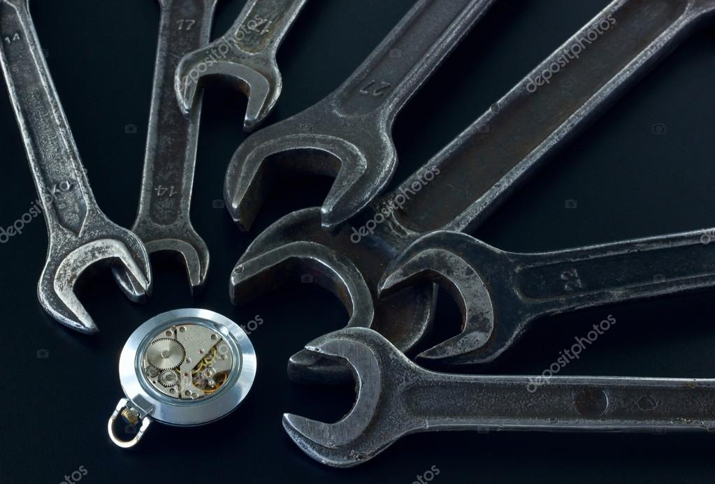 The clock mechanism and spanners. Stock Photo by ©kvnik60 86326782