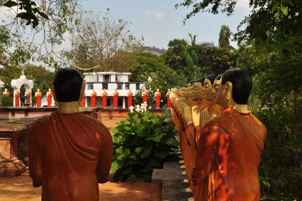 Buddhist Disciple statues at a temple in Sri Lanka — Stock Photo ...