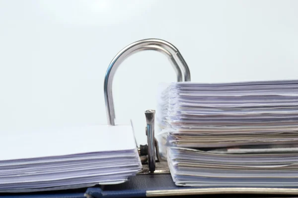 Open folder with documents filed Stock Photo by ©kelifamily 97295768