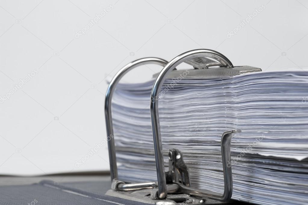 Open folder with documents filed Stock Photo by ©kelifamily 97295768