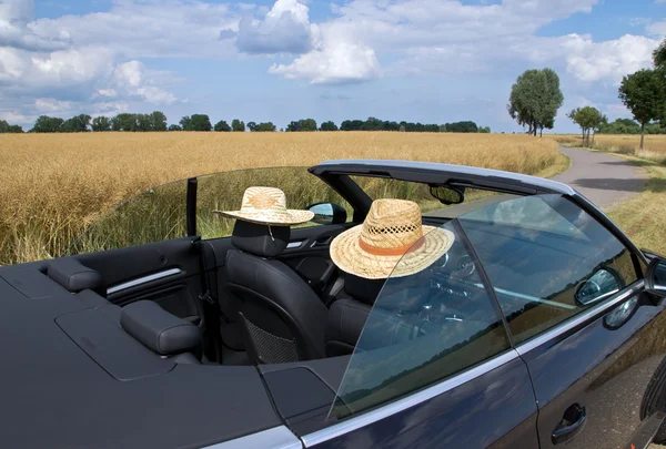 Summer, Sun, Car with two straw hats - Stock Image - Everypixel