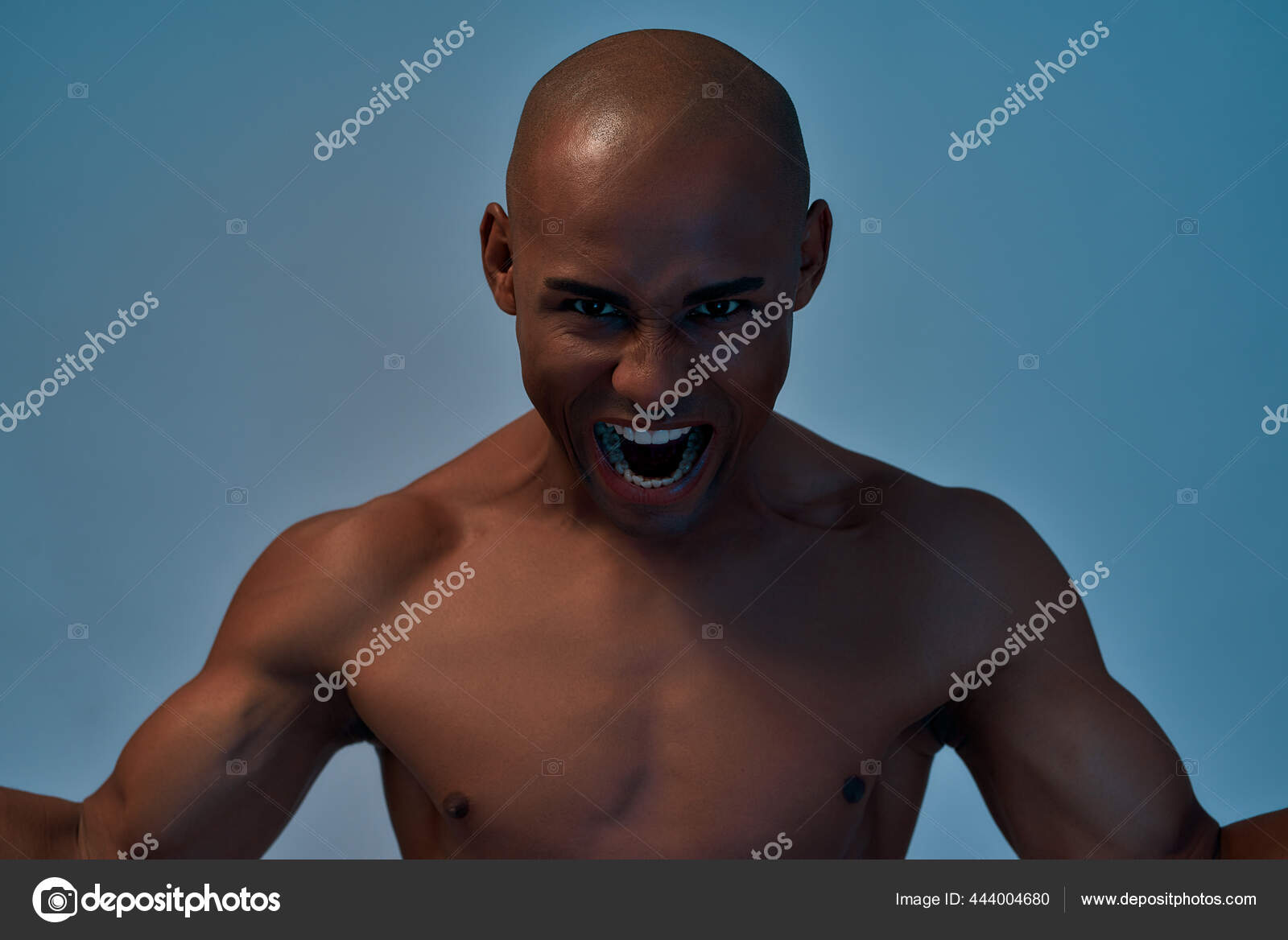 Evil athlete with bare body crying out loud — Stock Photo © LanaStock ...