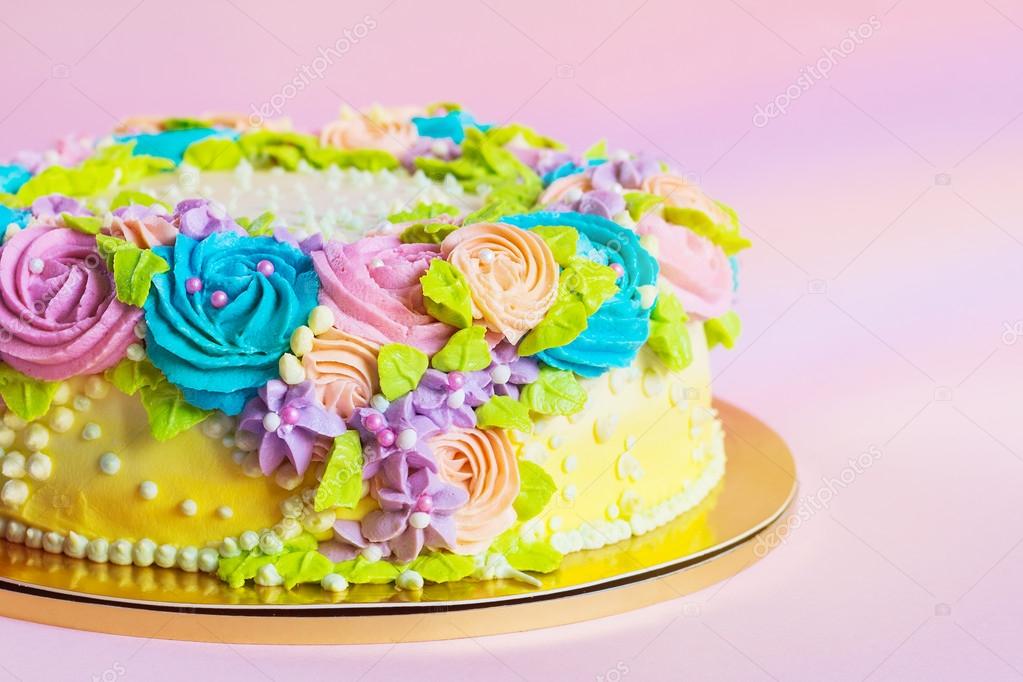 Bright colorful cake decorated with cream flowers Stock Photo by ...