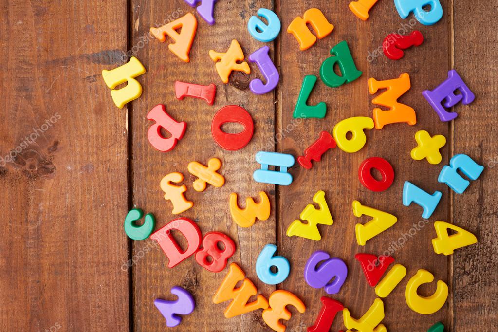 Colorful magnetic letters Stock Photo by ©nikolodion 112501214