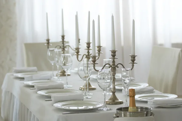 Decorated feast table in restaurant — Stock Photo © nikolodion #108745682