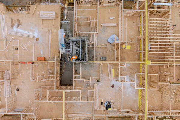 Aerial view of elevator shaft for concrete block building under ...