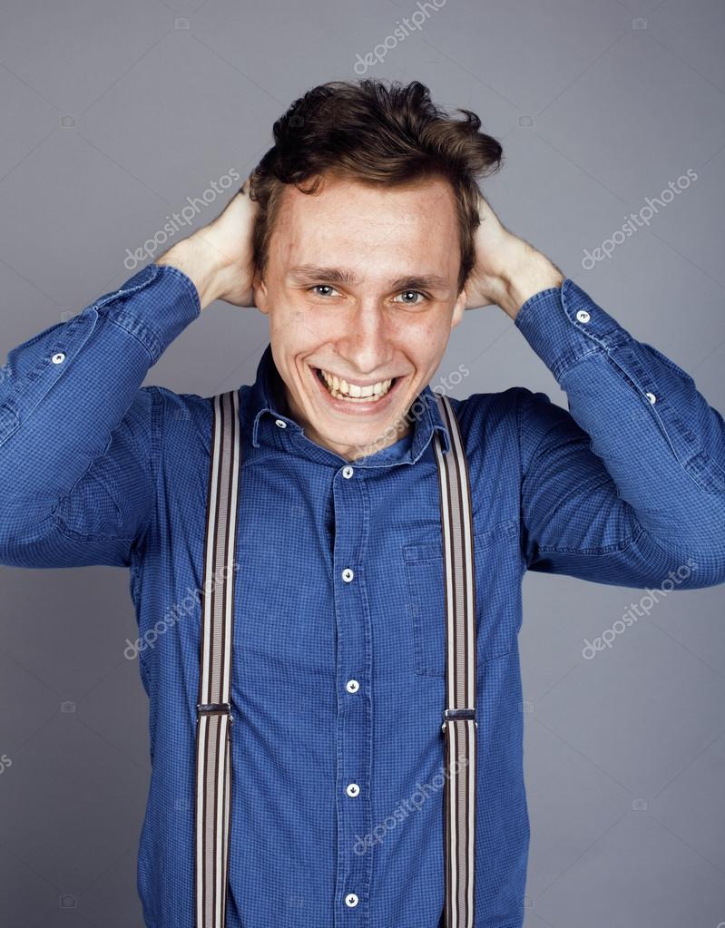 Young goofy man with pimples Stock Photo by ©iordani 105913584