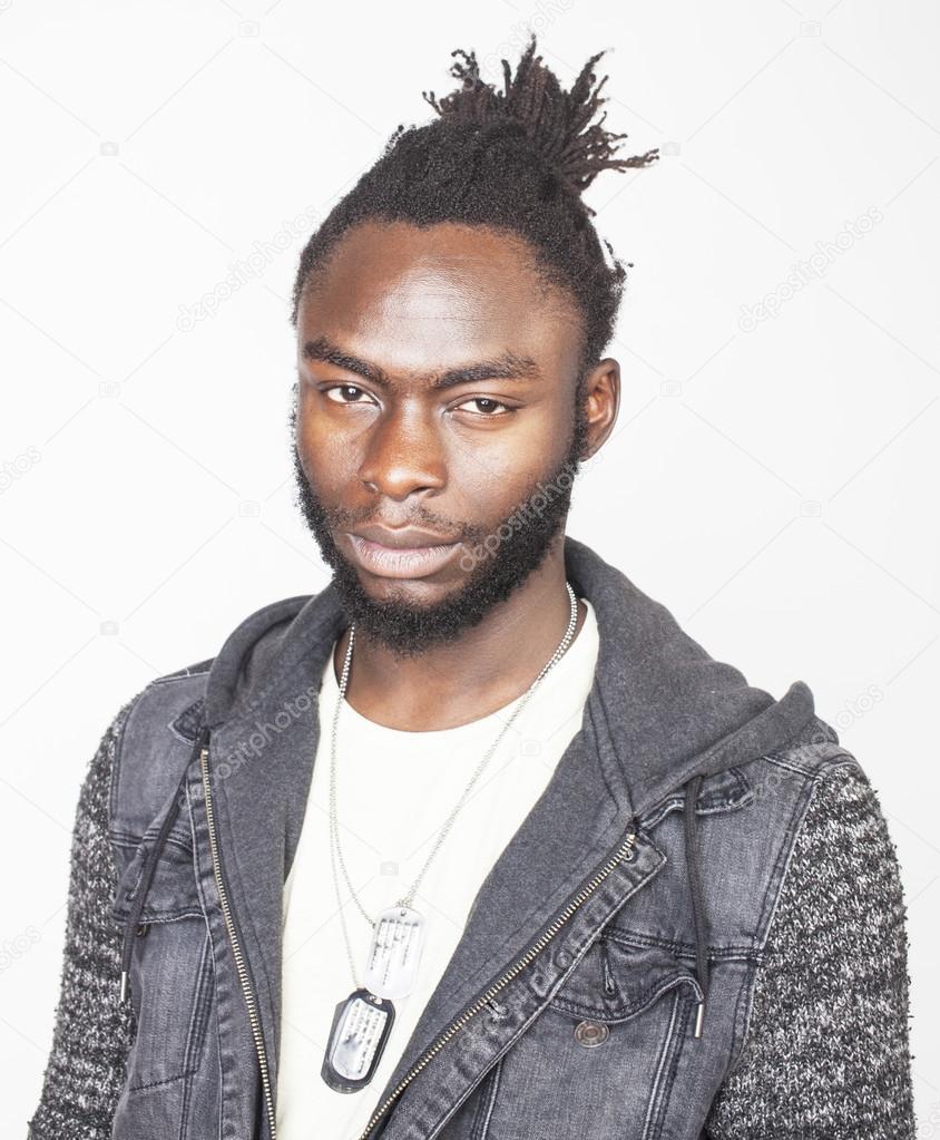 Young handsome afro american man with badge after war emotional ...