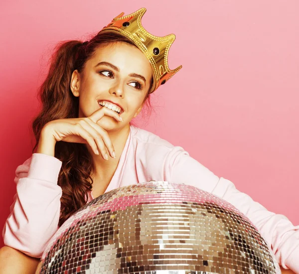 Young cute disco girl on pink background with ball and crown Stock ...