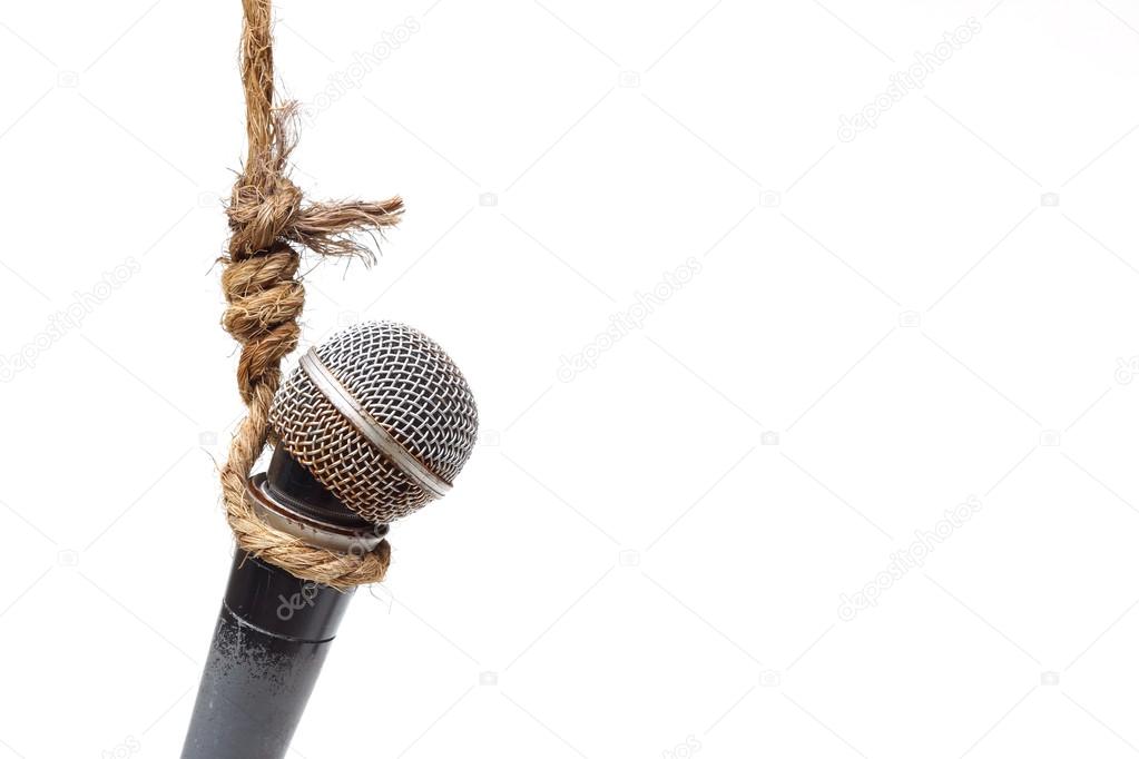 Broken microphone hung on a rope Stock Photo by ©weerapat 114699322