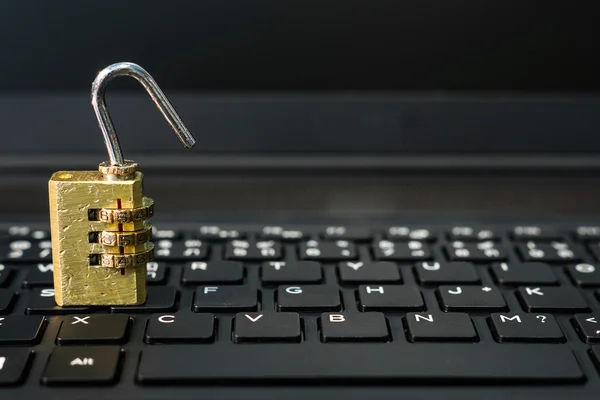 Unlocked security lock on keyboard - Stock Image - Everypixel