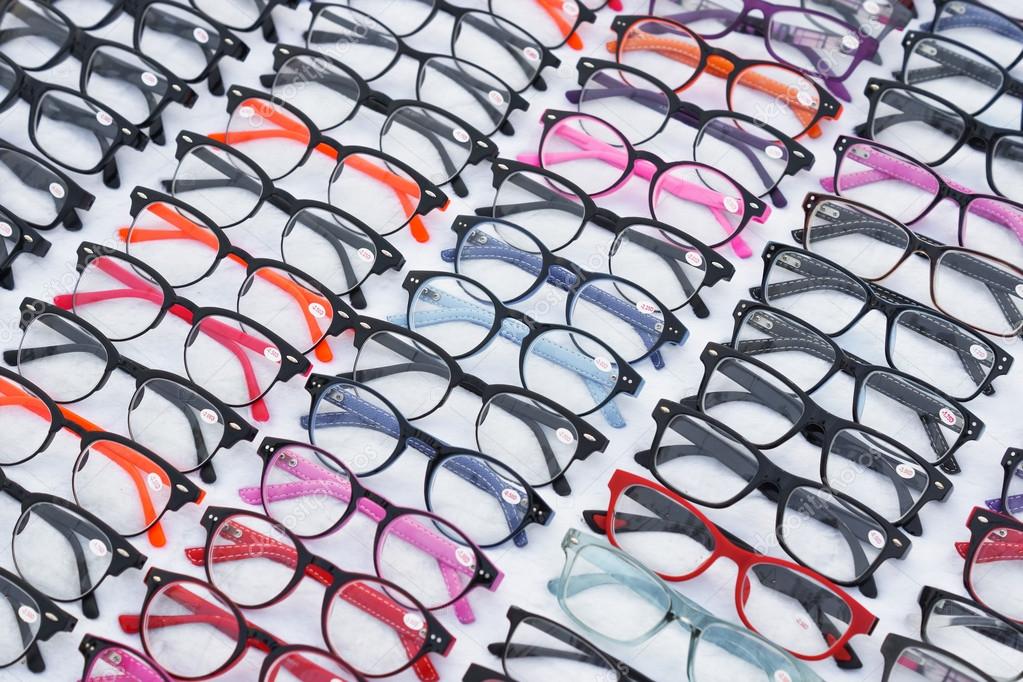 Colorful eyeglasses background — Stock Photo © weerapat #74091267