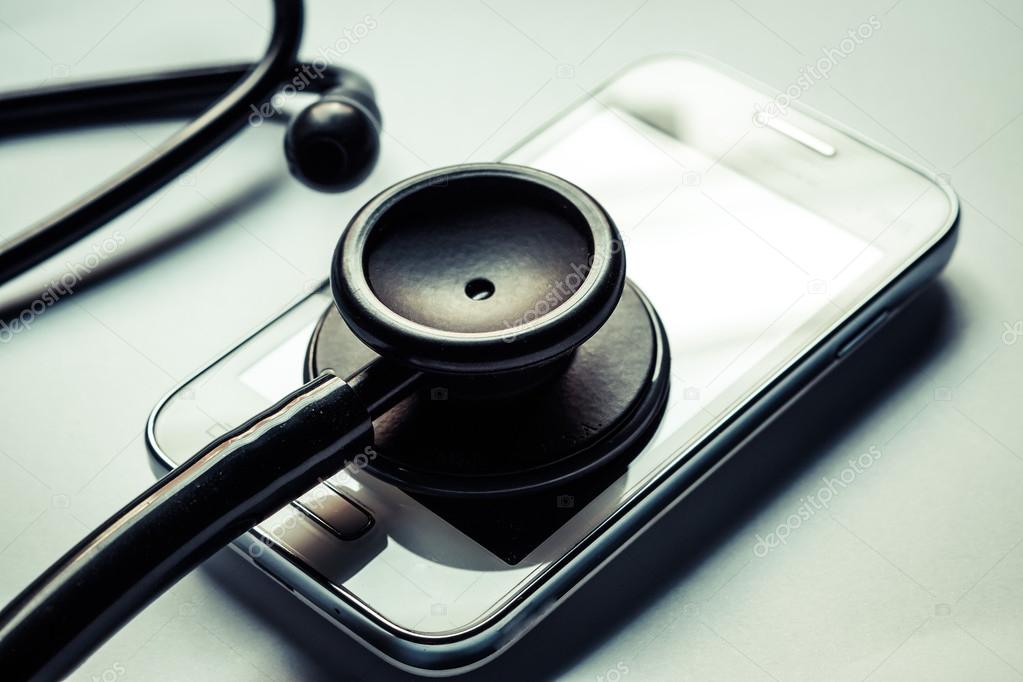 Stethoscope to check smartphone system Stock Photo by ©weerapat 80439662