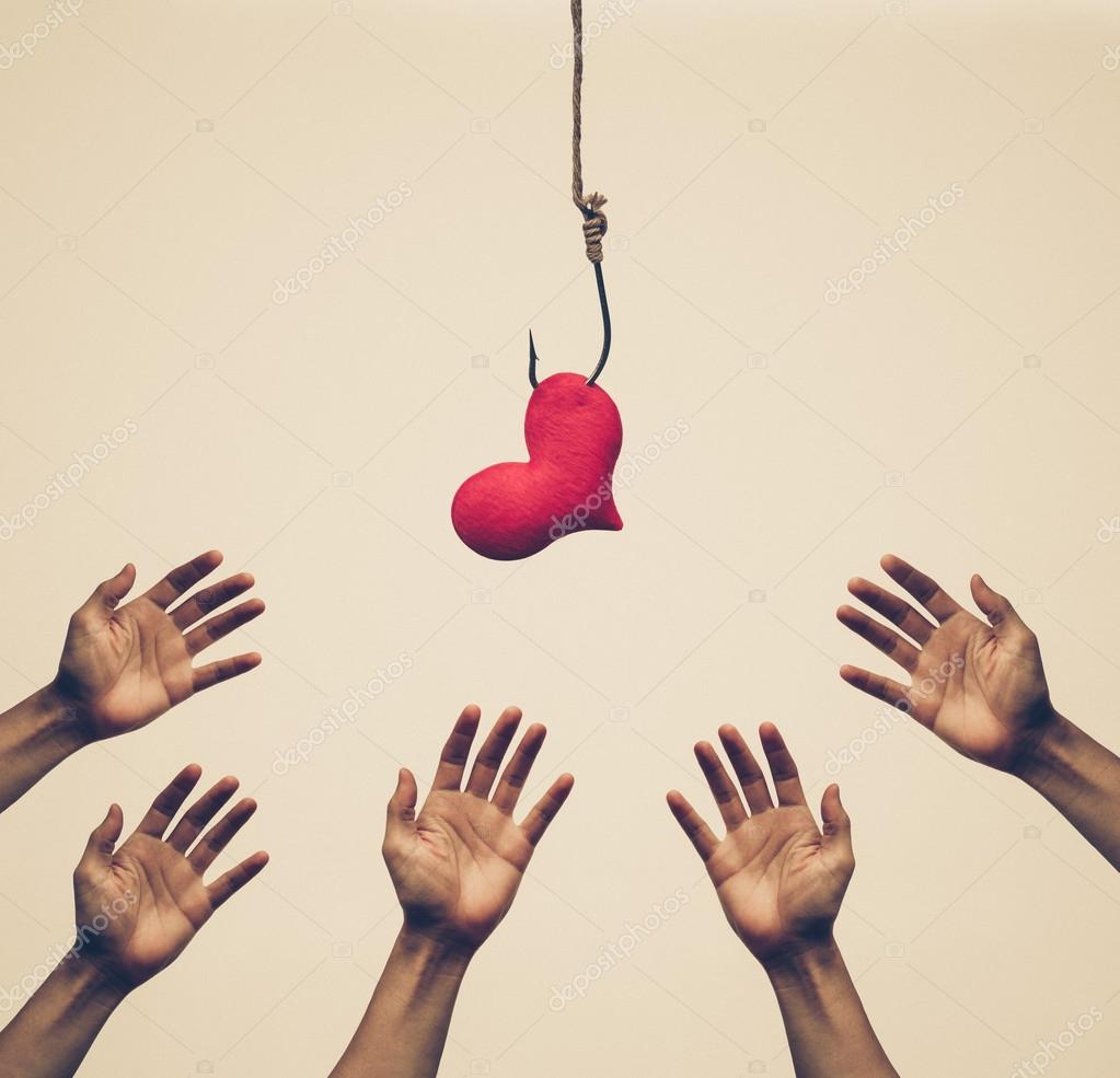 Red heart on a fish hook — Stock Photo © weerapat #82037524