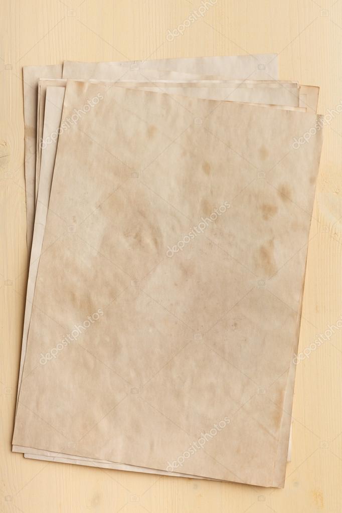 Yellowed old paper stack Stock Photo by ©milarka 100478758