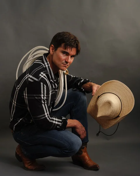 The stud cowboy awaits Stock Photo by ©romancephotos 149597250