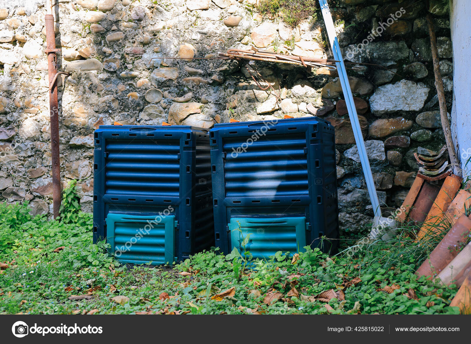 Two Plastic Compost Bins Garden Stone Wall Background Stock Photo by ...