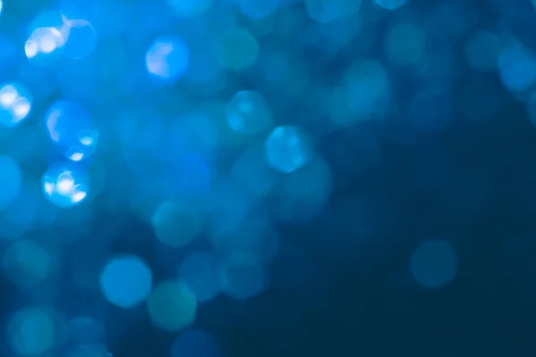 Dark blue sparkle glitter, deep blue sea water in a bit low light ...