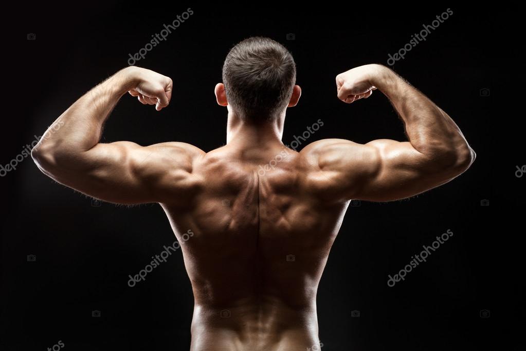 Man back shows big muscles. Stock Photo by ©kladyk 55722819