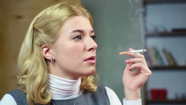 Female thinking about her life and smoking a cigarette. Unhealthy ...