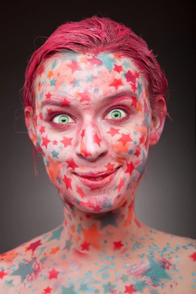 Joyful woman with stars on the face - Stock Image - Everypixel