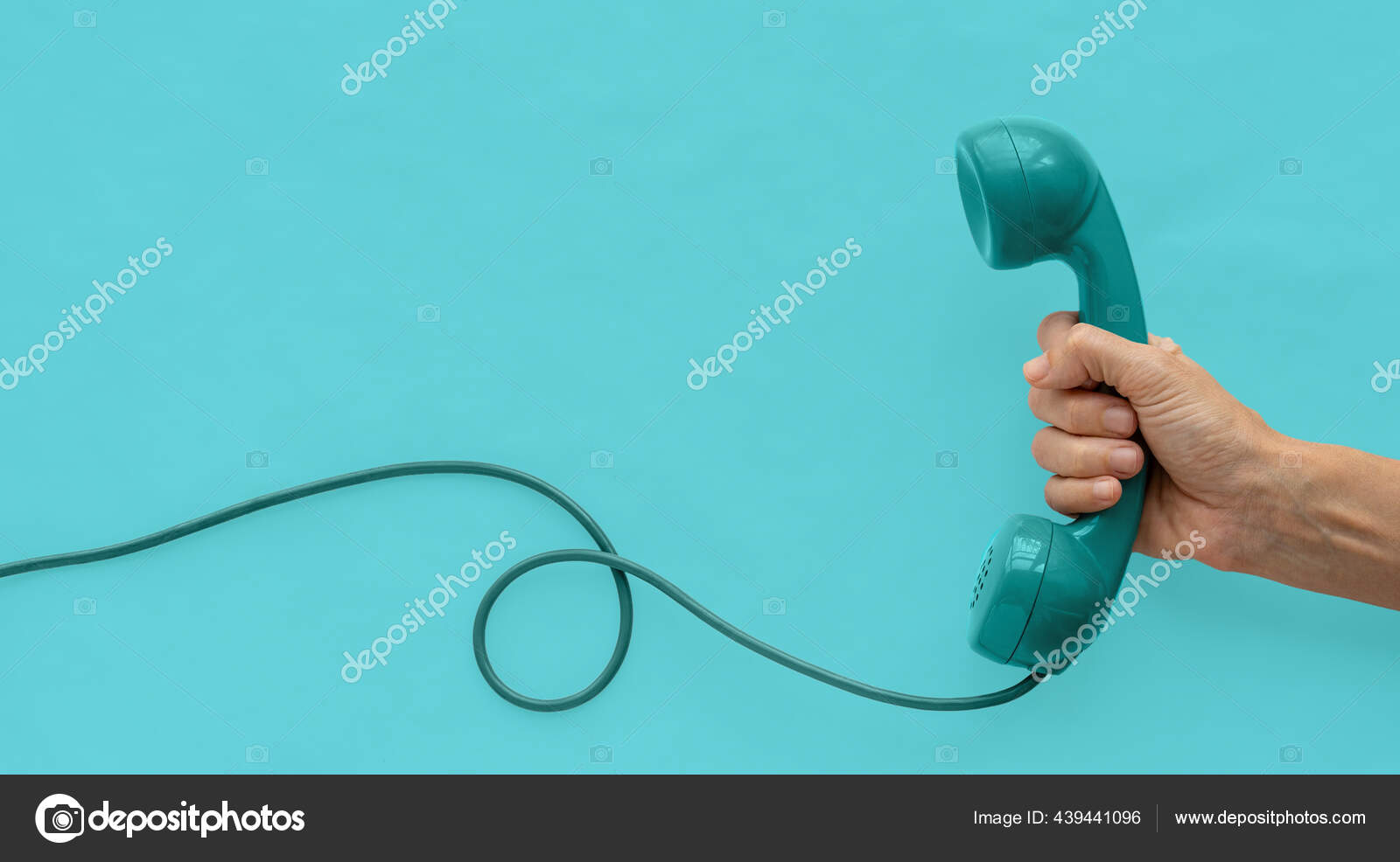 A vintage dial telephone handset with one hand and background. — Stock ...