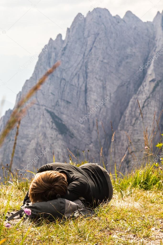 Girl resting in front of the mountain peak — Stock Photo © mitch.zul ...
