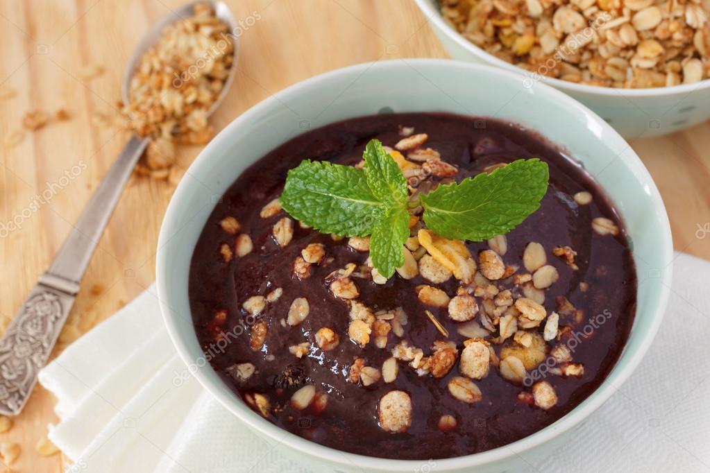 Brazilian dessert Acai pulp with muesli Stock Photo by ©jantroyka 79033638