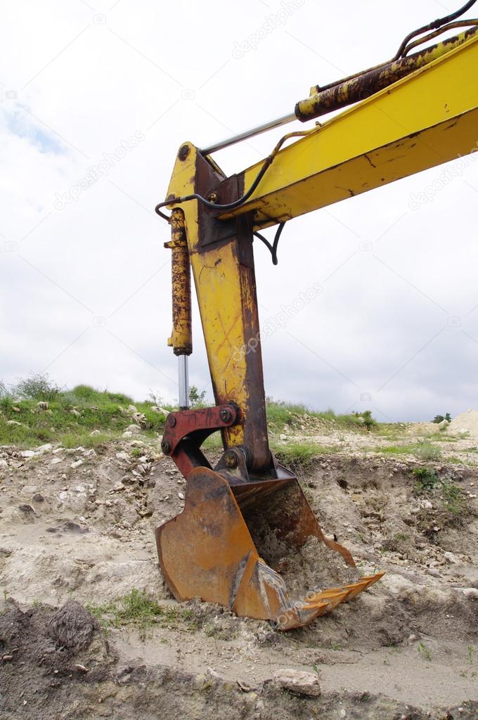 Backhoe excavator in sand quarry in cloudy day — Stock Photo ...