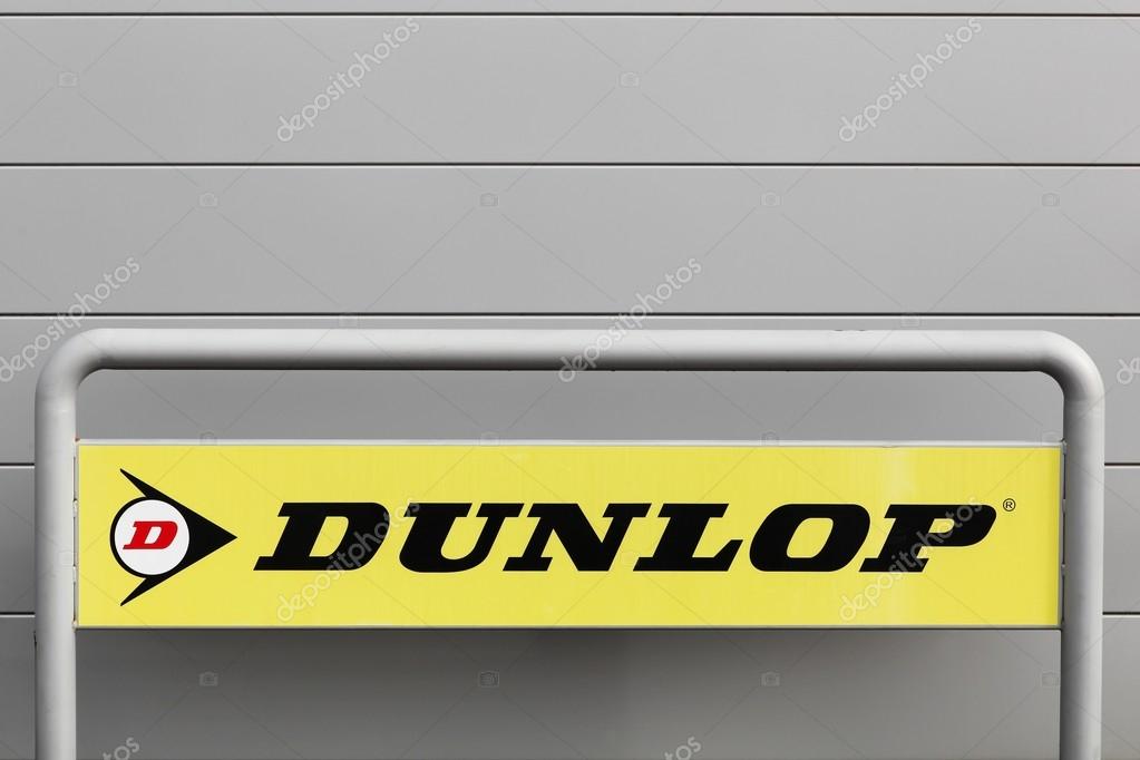 Dunlop logo on a wall – Stock Editorial Photo © ricochet69 #98064092