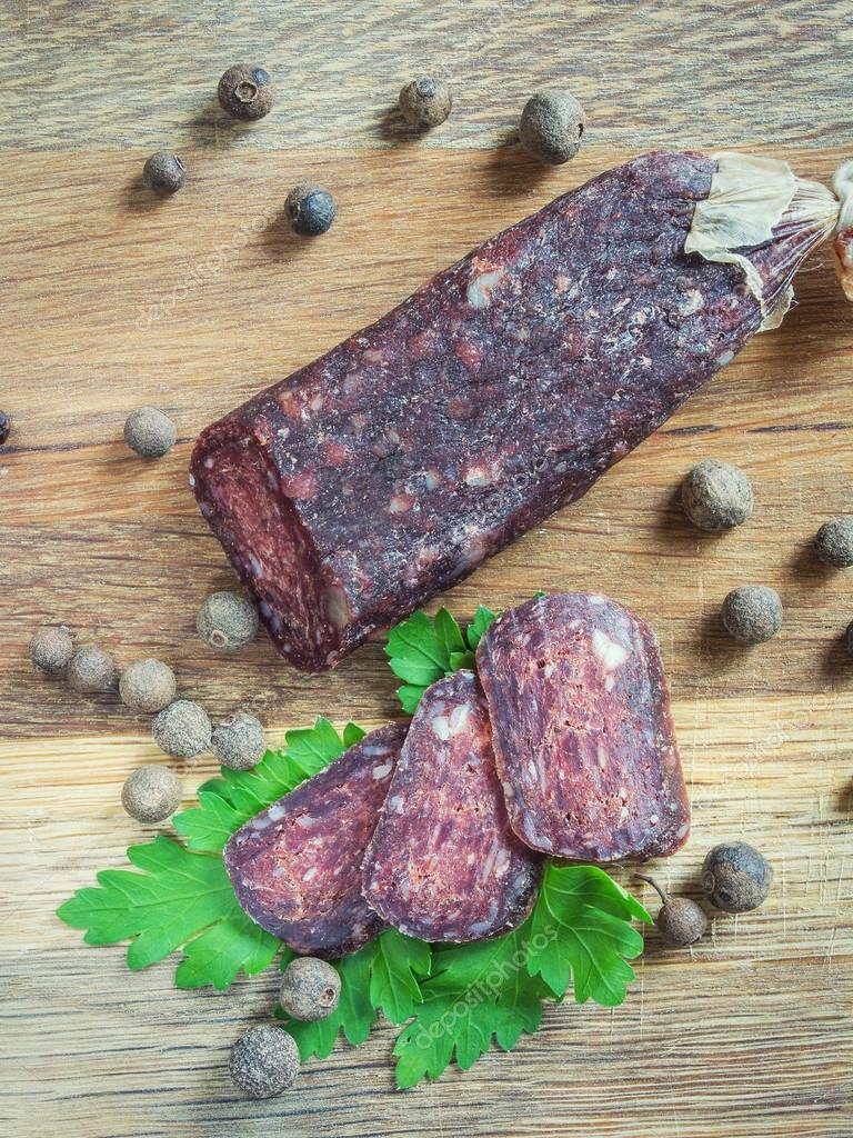 Sujuk sliced with fresh herbs and pepper Stock Photo by ©andrei_77 ...