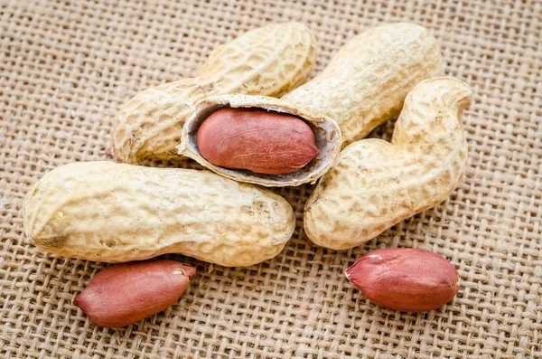 Peanuts in shells. - Stock Image - Everypixel